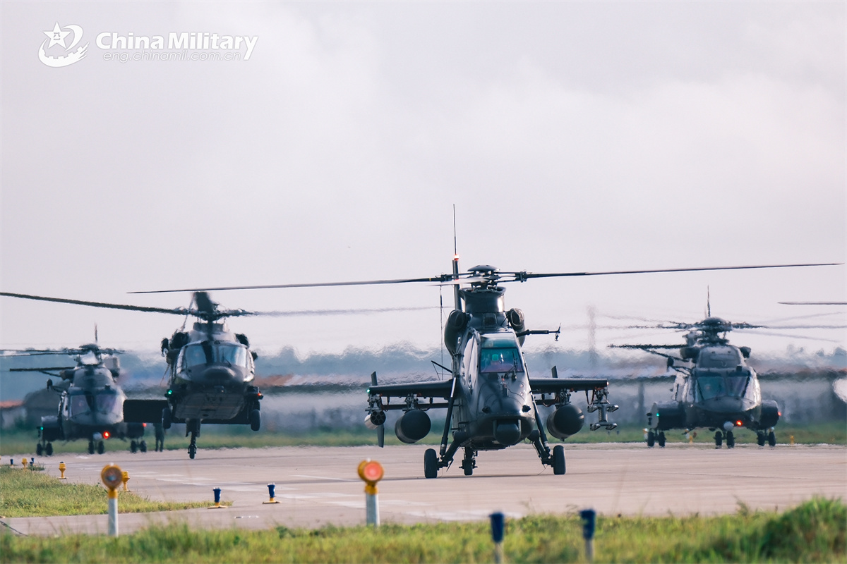 A female pilot assigned to a brigade under the Chinese PLA Army gets ...