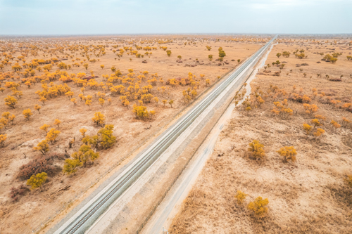 China inaugurates world's first desert rail loop in Xinjiang